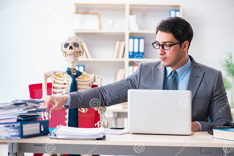 The Businessman Working with Skeleton in Office Stock Image - Image of ...