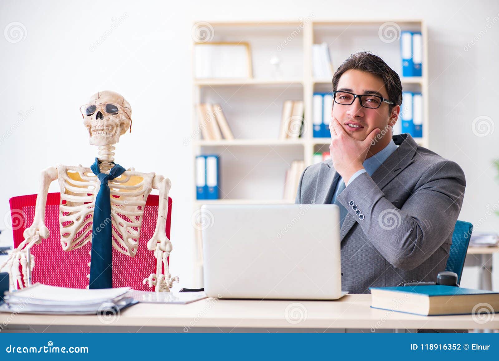 The Businessman Working with Skeleton in Office Stock Photo - Image of ...