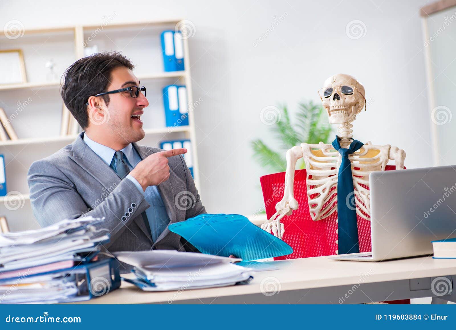 The Businessman Working with Skeleton in Office Stock Photo - Image of ...