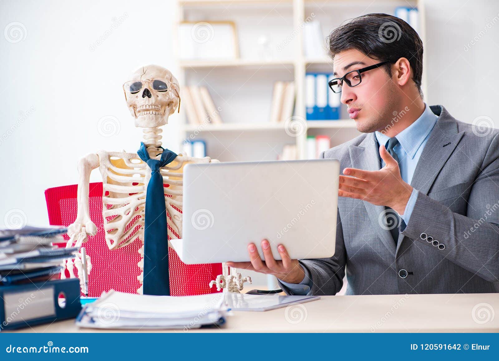 The Businessman Working with Skeleton in Office Stock Photo - Image of ...