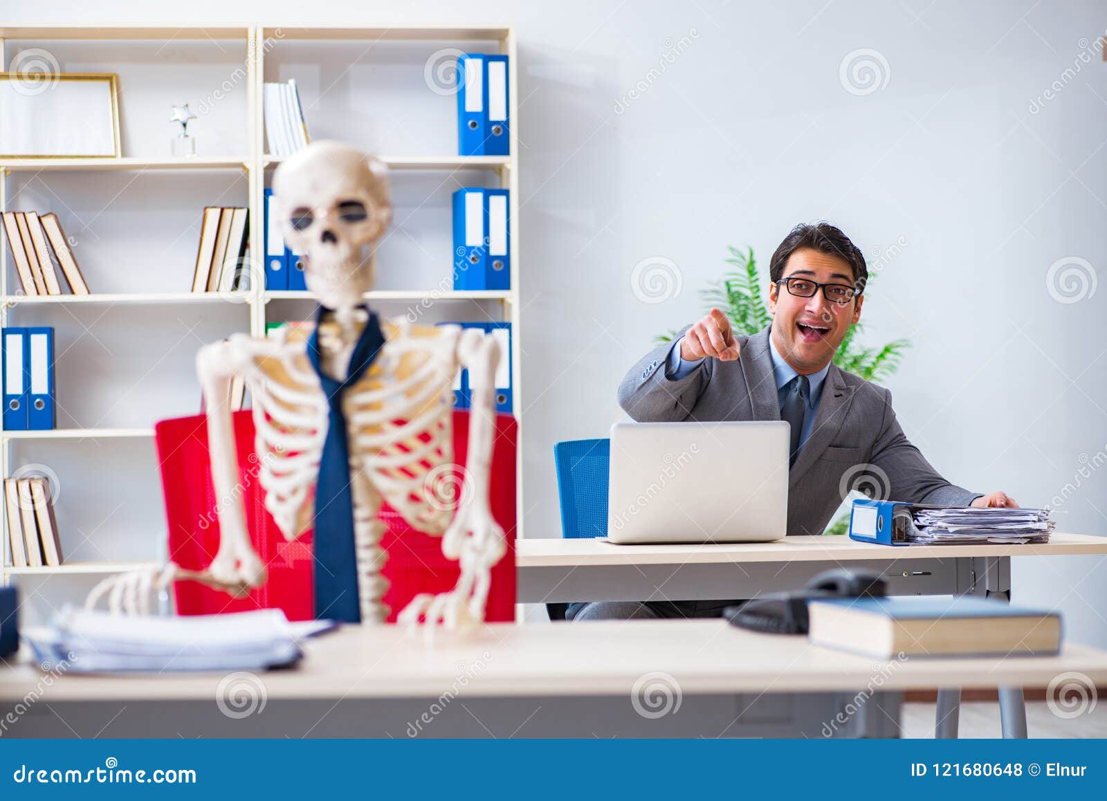 The Businessman Working with Skeleton in Office Stock Photo - Image of ...