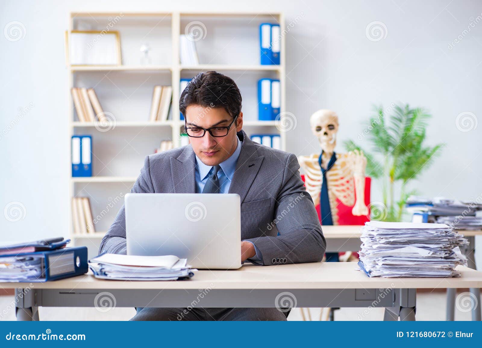 The Businessman Working with Skeleton in Office Stock Photo - Image of ...