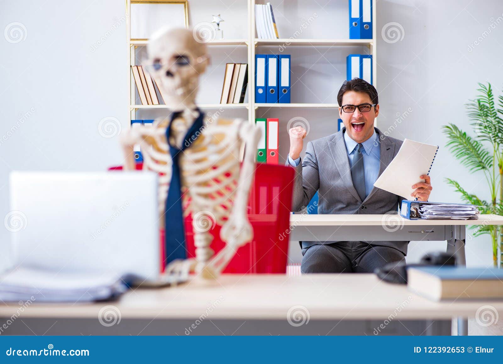 The Businessman Working with Skeleton in Office Stock Image - Image of ...