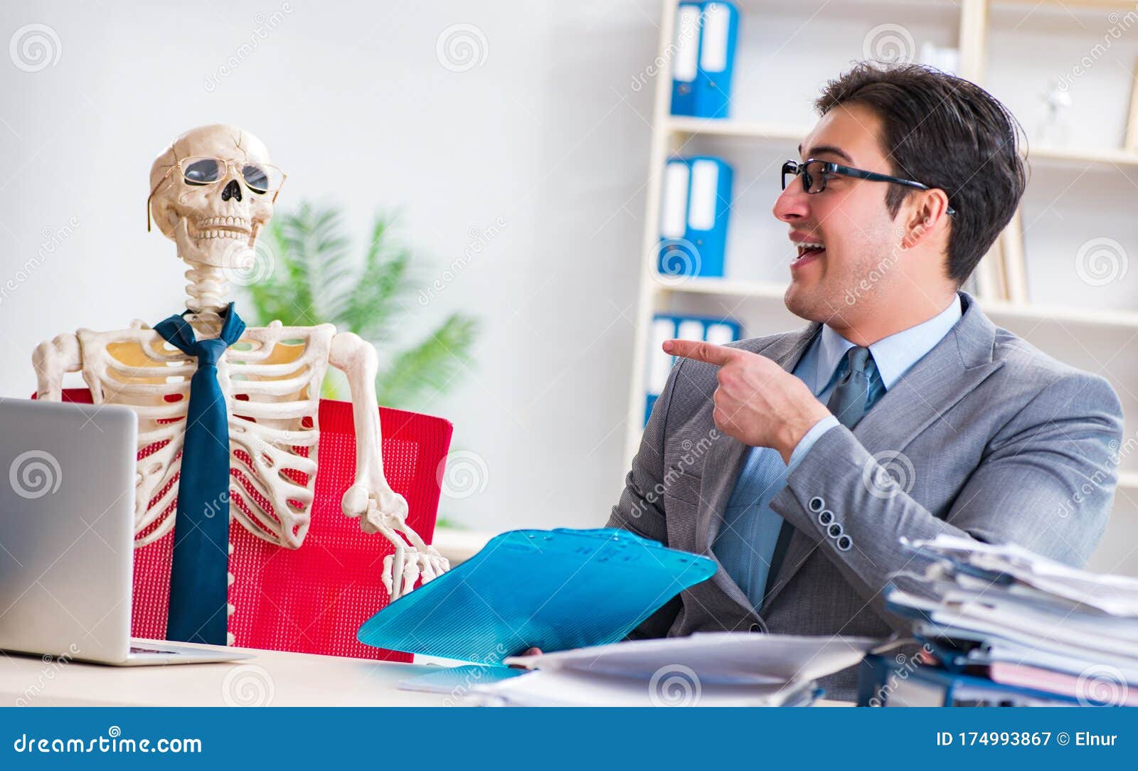 Businessman Working with Skeleton in Office Stock Image - Image of ...