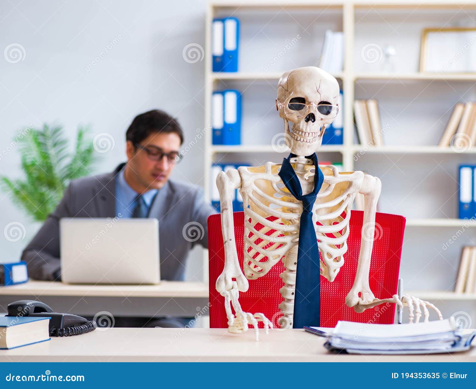 Businessman Working with Skeleton in Office Stock Image - Image of dead ...