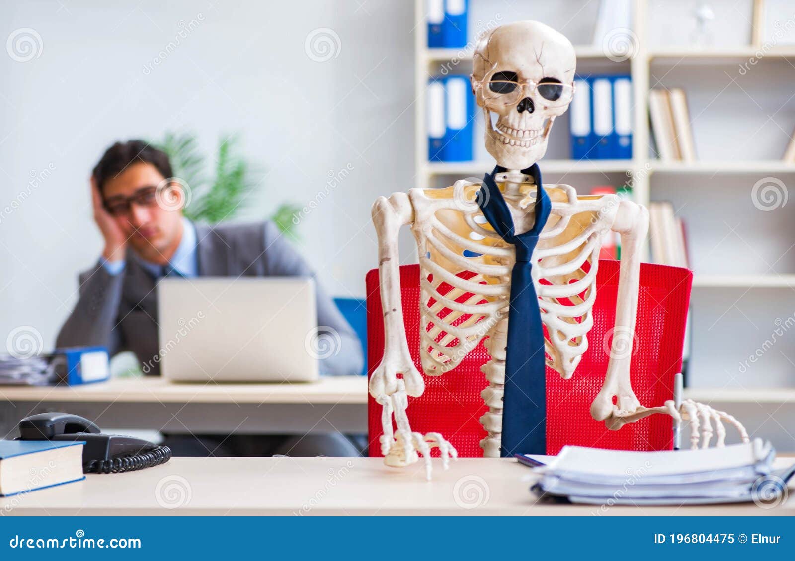 Businessman Working with Skeleton in Office Stock Image - Image of ...