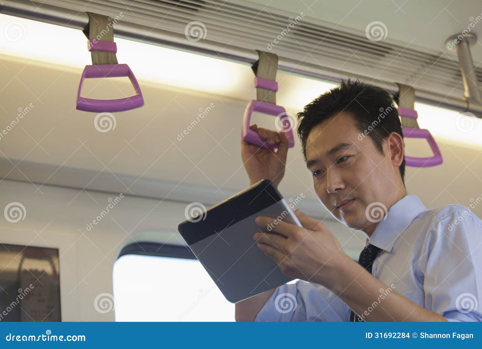 Businessman Working in the Subway Stock Photo - Image of business ...