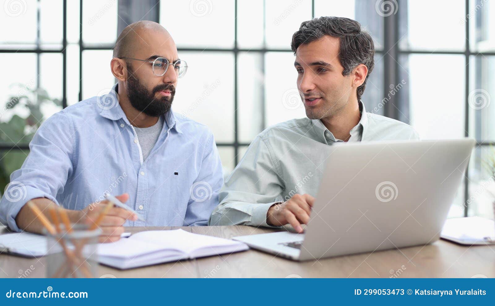 Businessman Working on the Table with Laptop in a New Office Stock ...