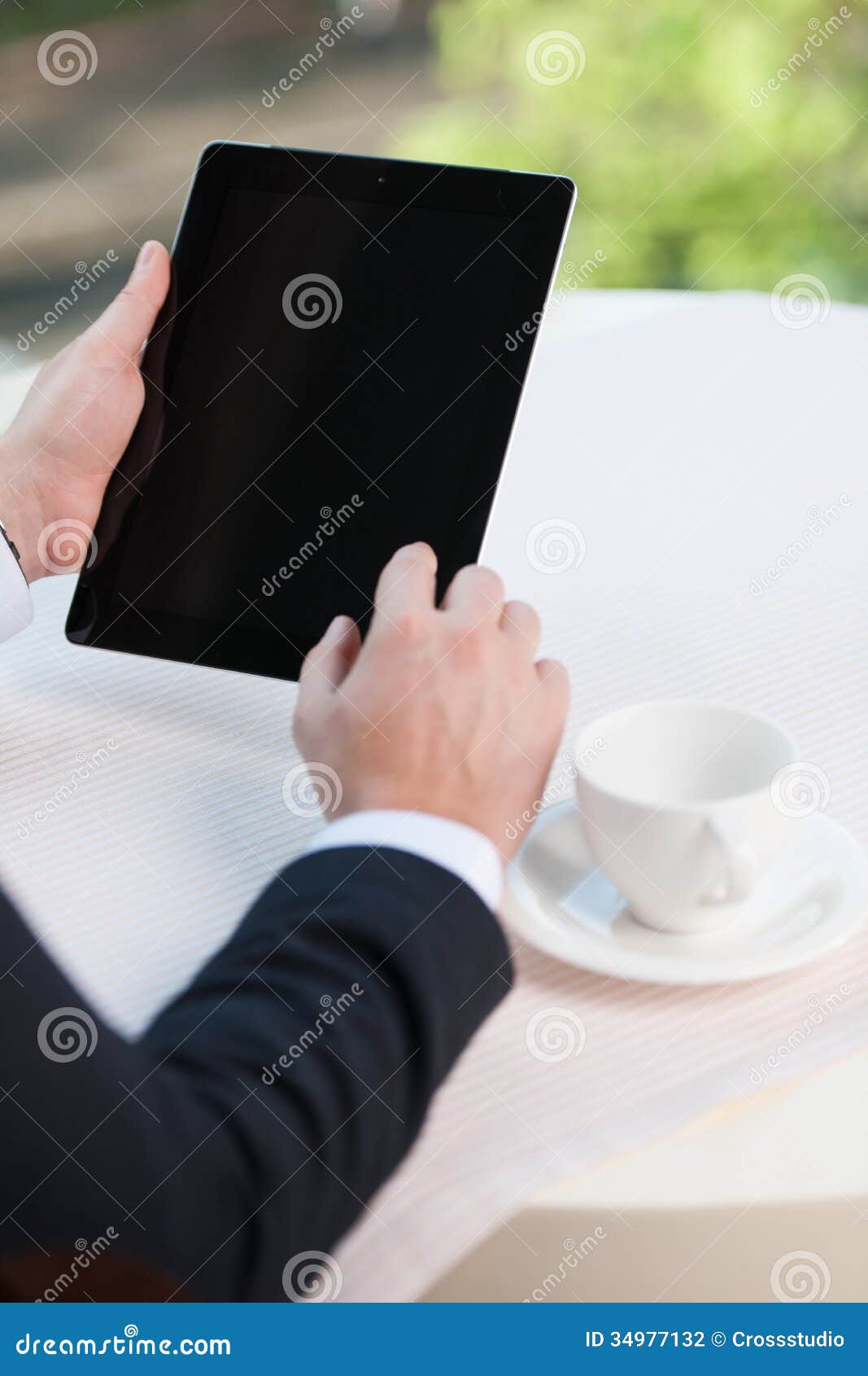 Businessman Working on a Tablet Computer. Stock Photo - Image of media ...