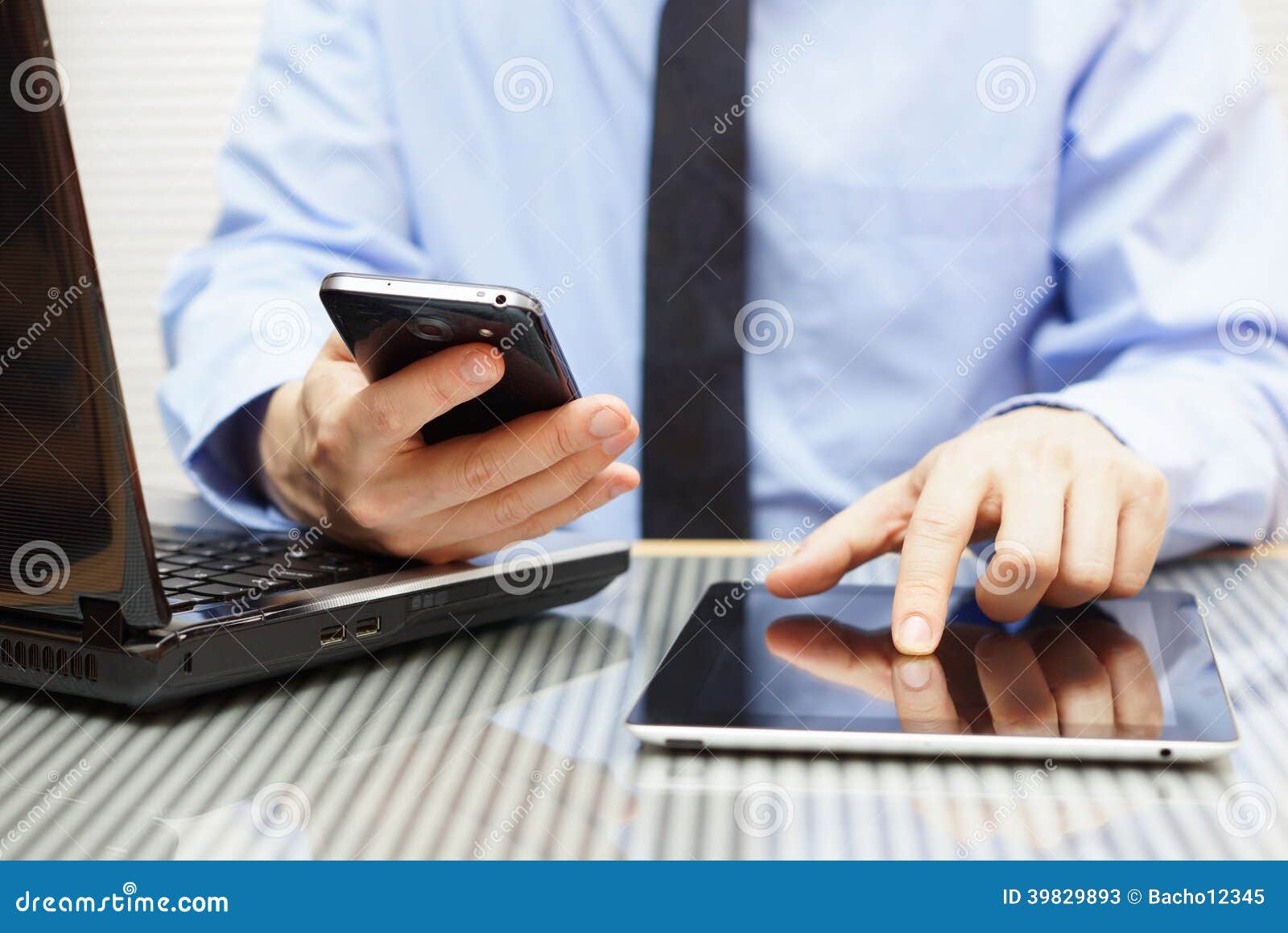 Businessman is Working on Tablet and Using Smart Phone Stock Image ...
