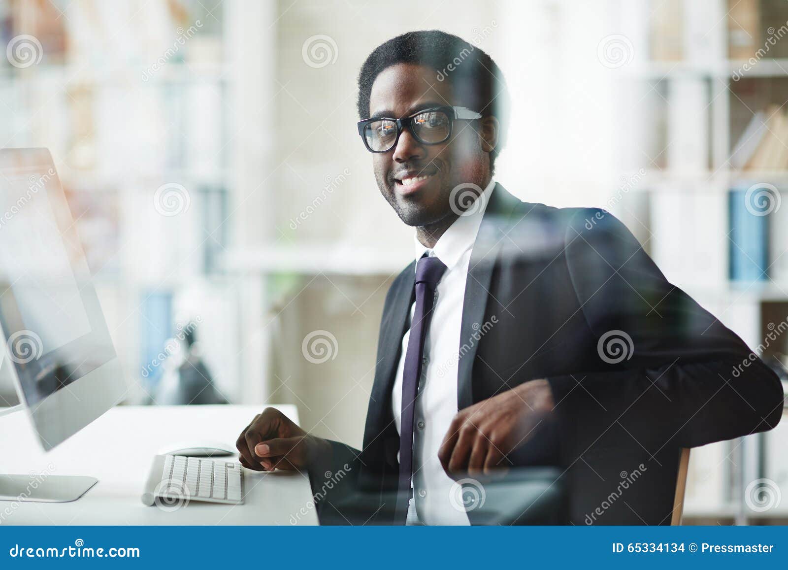 Businessman at workplace stock photo. Image of business - 65334134