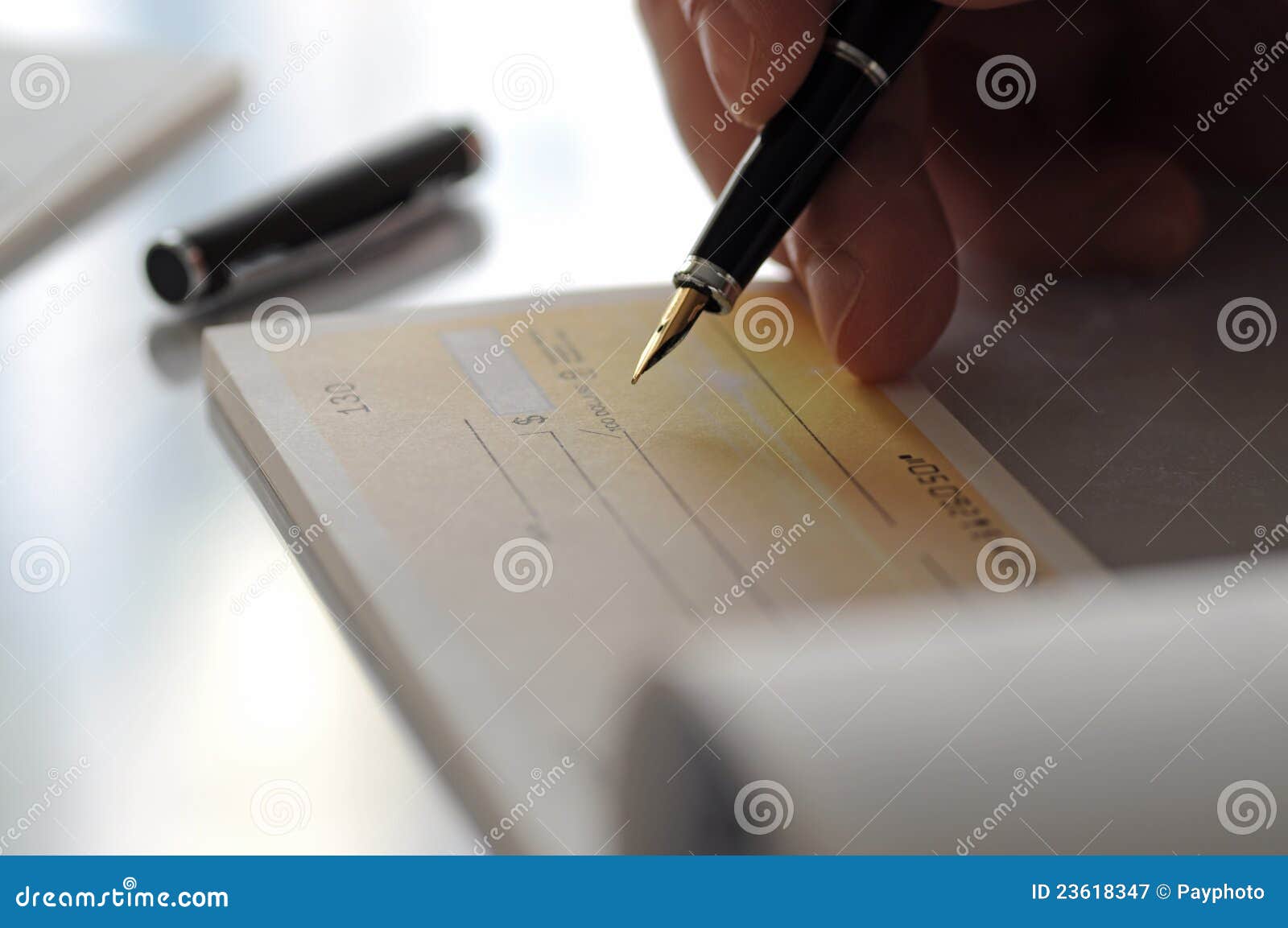 Businessman Writing the Check Stock Image - Image of number, bank: 23618347