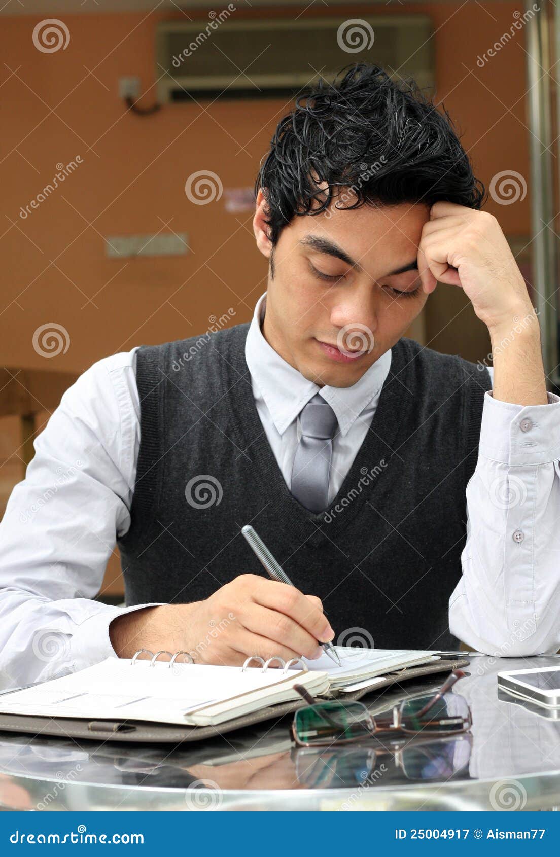 Businessman Writing a Diarybook Stock Image - Image of male, portrait ...