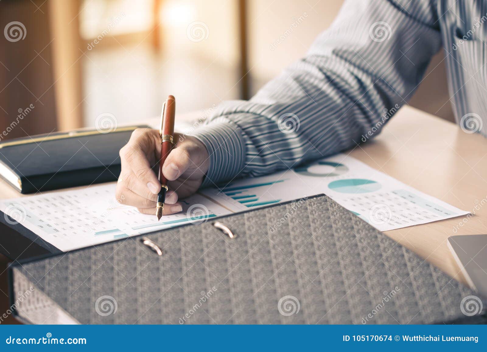 Businessman Writing Make Note on Paperwork Chart Summary Report Stock ...