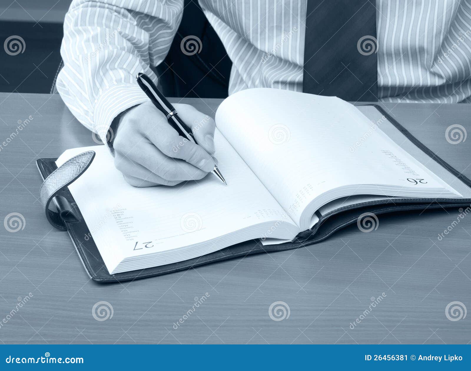 Businessman writing a note stock image. Image of holding - 26456381