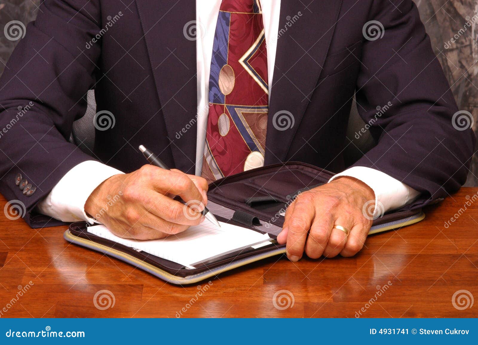 Businessman Writing in Notebook Stock Image - Image of paper, notebook ...