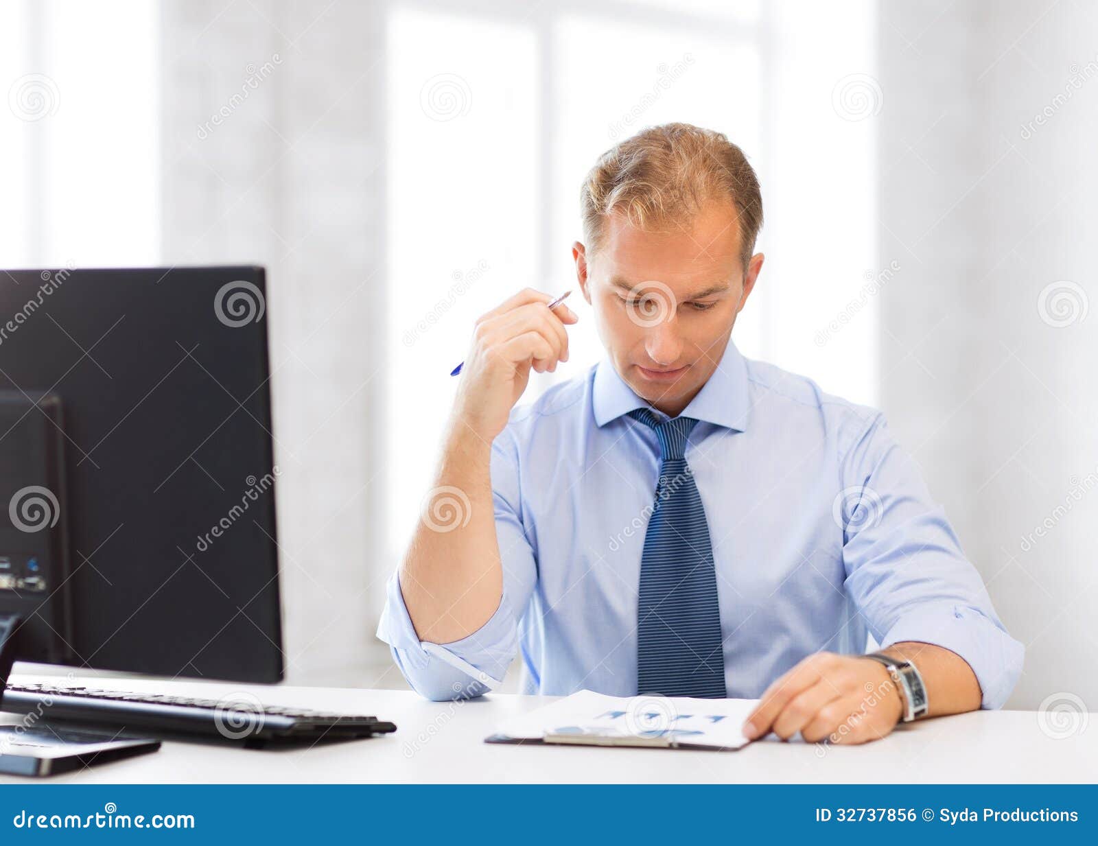 Businessman Writing in Notebook Stock Photo - Image of businessman ...