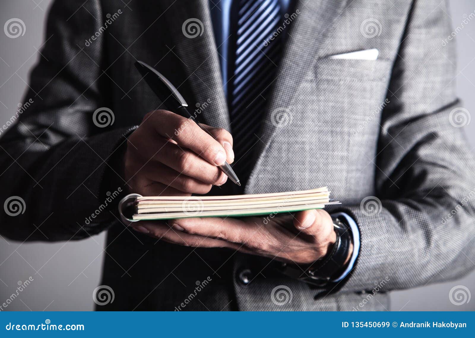 Businessman Writing on Notepad. Business Concept Stock Image - Image of ...