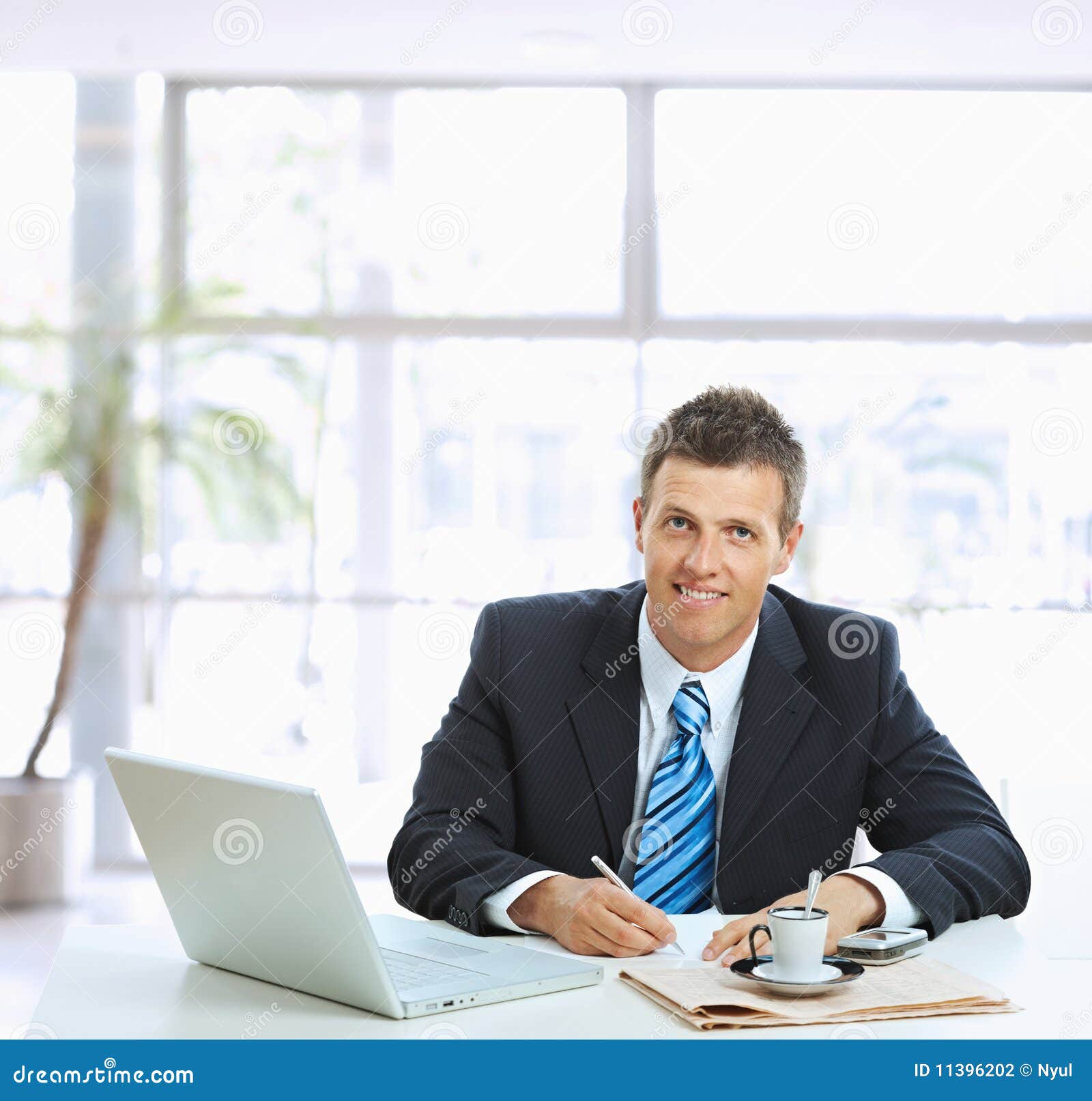 Businessman writing notes stock photo. Image of employment - 11396202