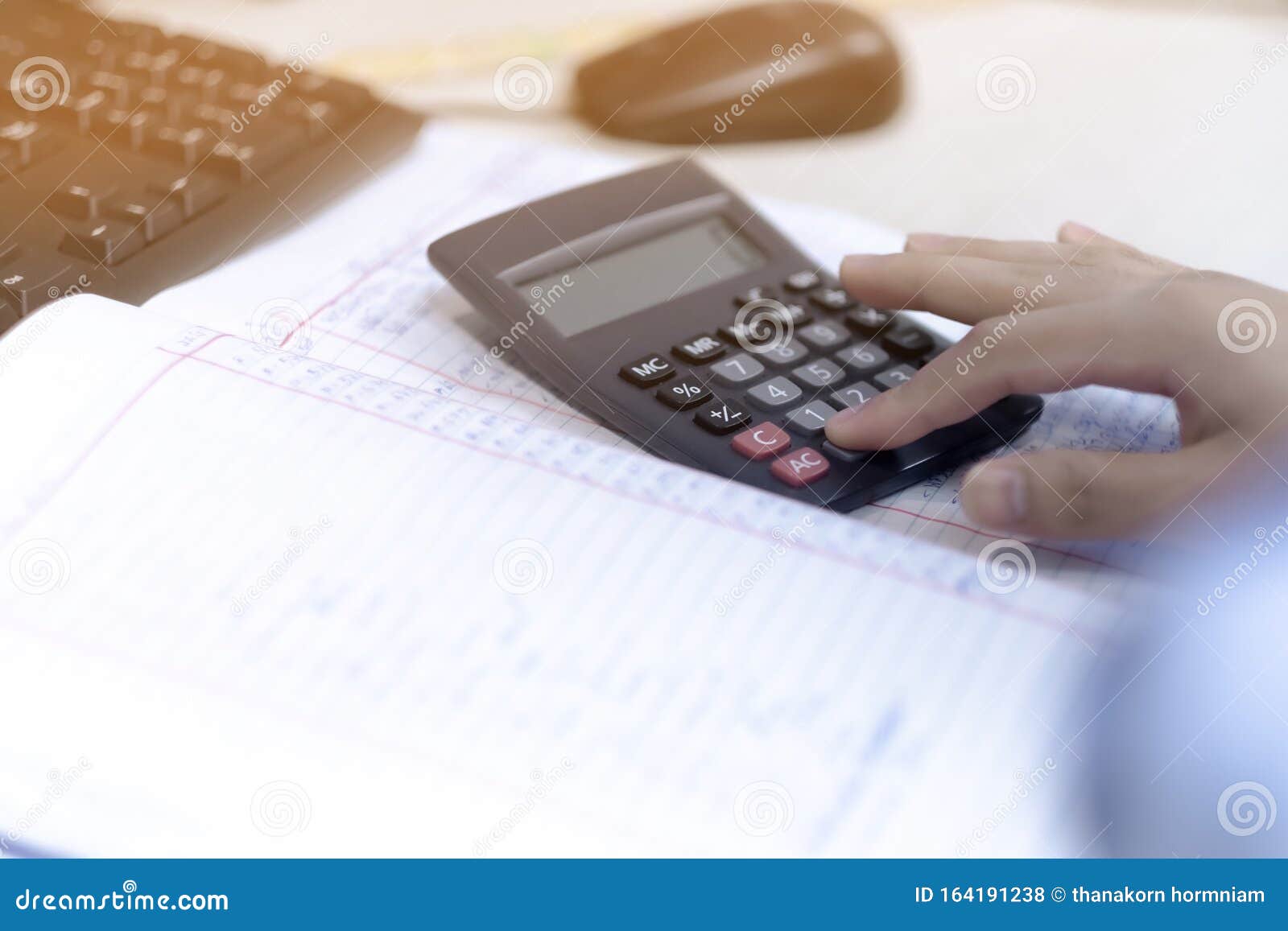 Businessmen are Calculating a Revenue and Expense Account Using a ...