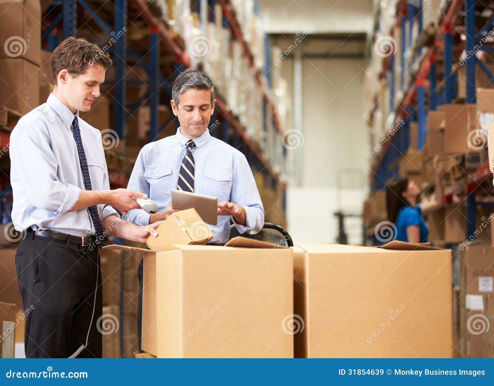 Businessmen Checking Boxes with Digital Tablet and Scanner Stock Image ...