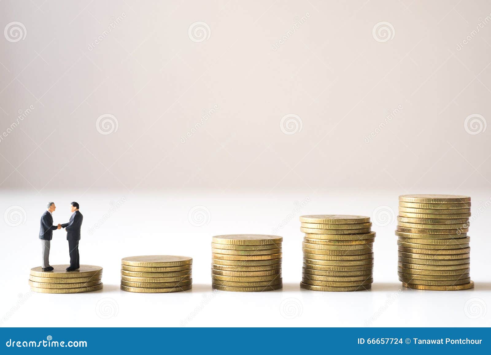 Businessmen Checking Hand on First Step of Coin Stack Stair. Stock ...