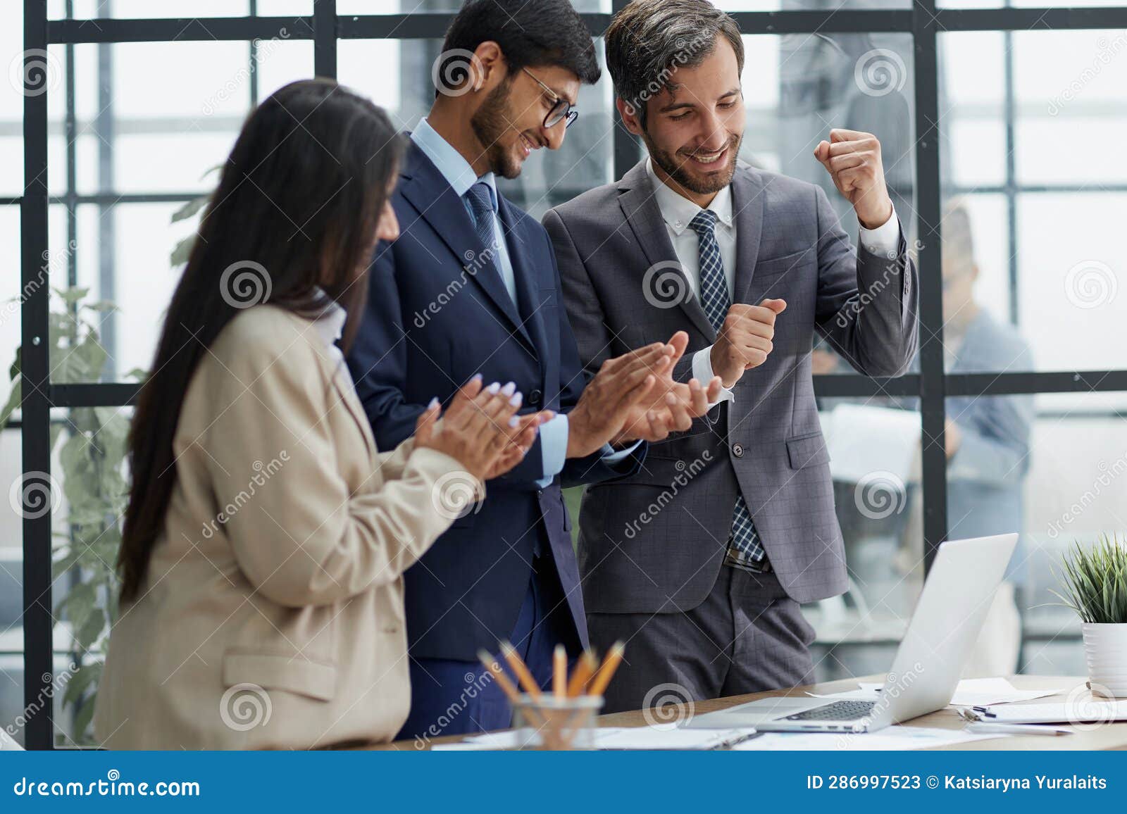 Businessmen Clapping Their Hands while Standing in the Office Stock ...