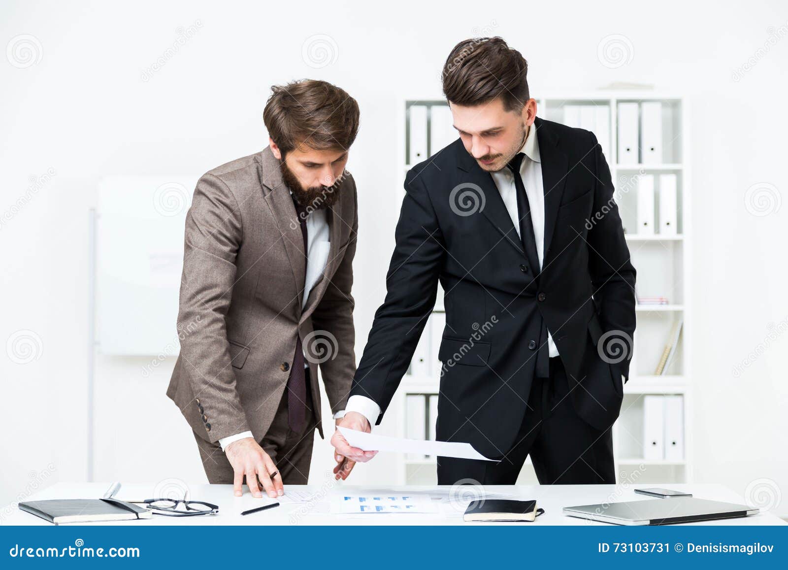 Businessmen Doing Paperwork Stock Image - Image of colleague, adult ...
