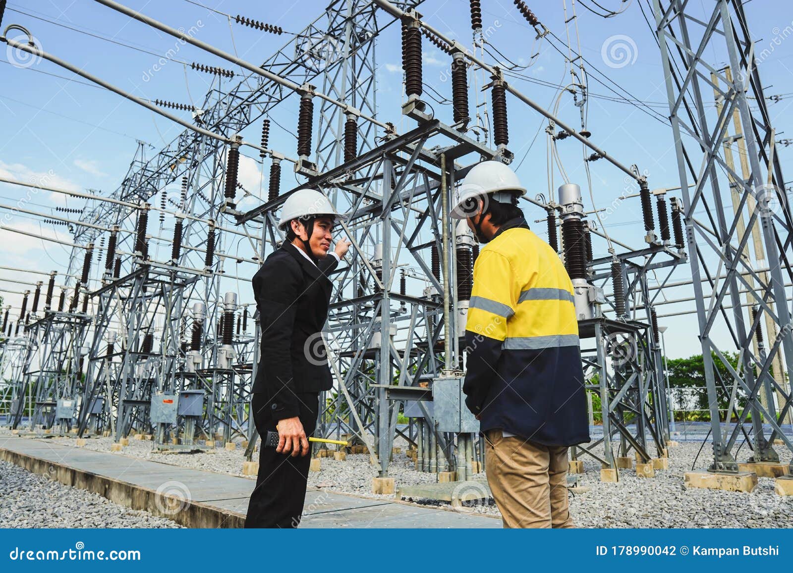 Businessmen And Engineers Are Talking About Problems And Electricity ...