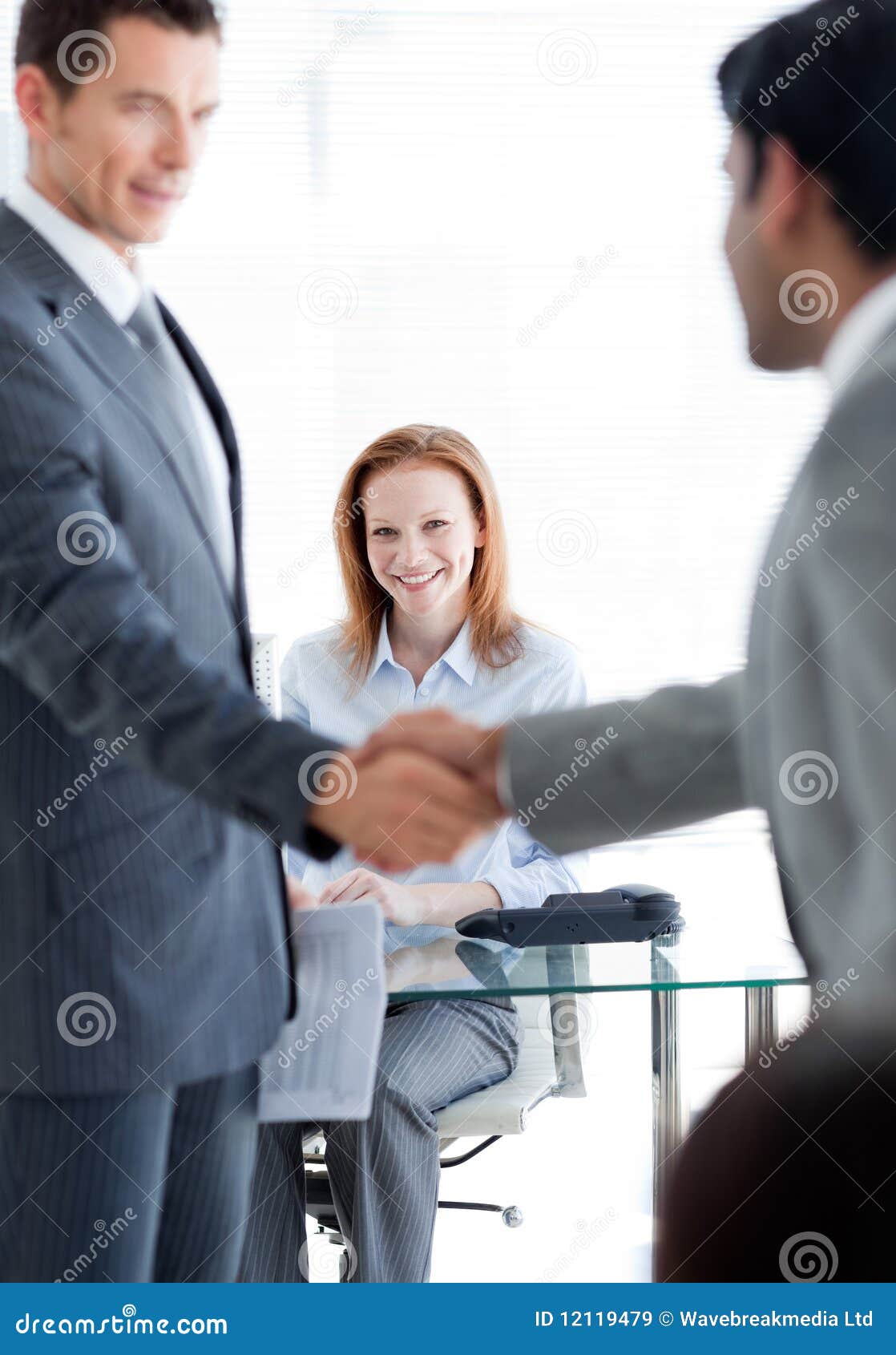 Businessmen Greeting Each Other at a Job Interview Stock Image - Image ...