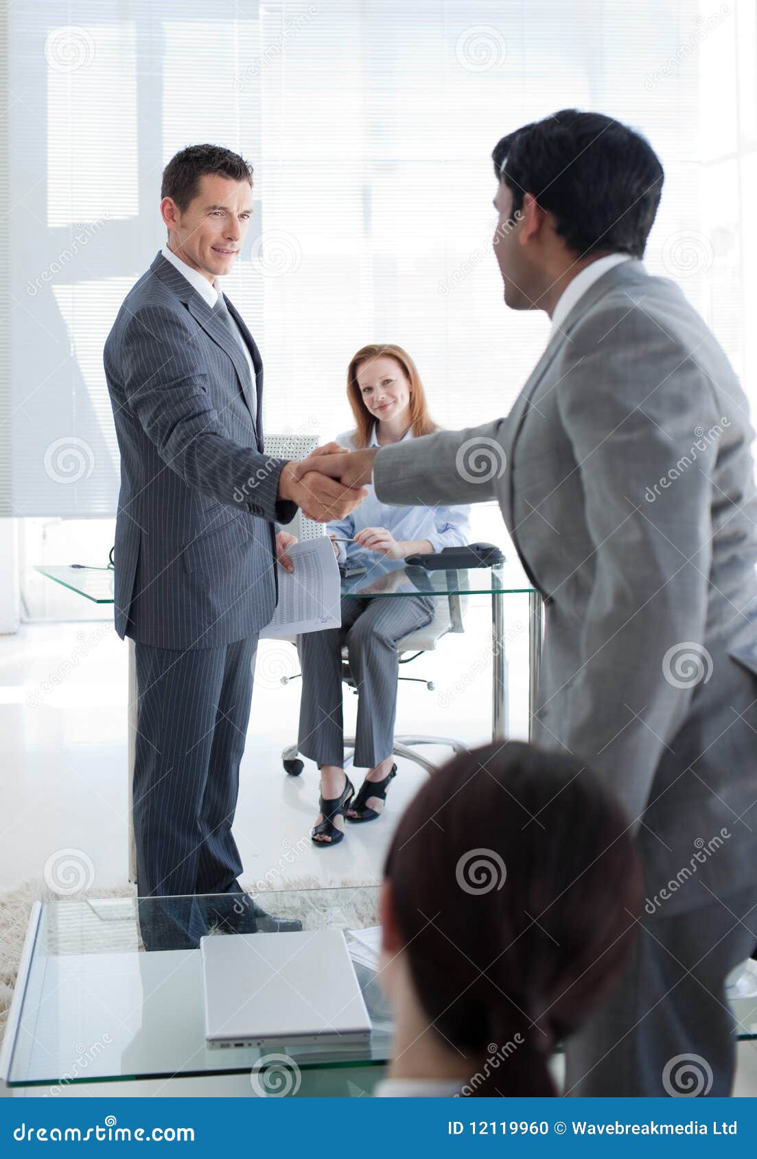 Businessmen Greeting Each Other At A Job Interview Stock Photo - Image ...