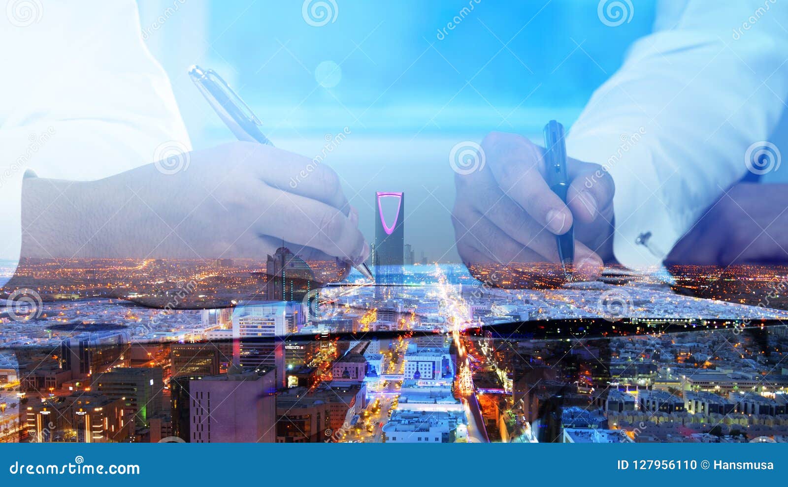 Businessmen Hands Signing Documents on Riyadh Skyline City Scape ...