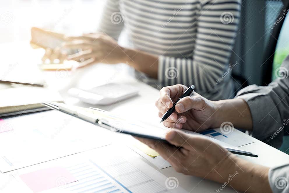 Businessmen Holding Pens and Notes To Write Business Ideas Stock Photo ... Businessmen Holding Pens and Notes To Write Business Ideas Stock Photo ...