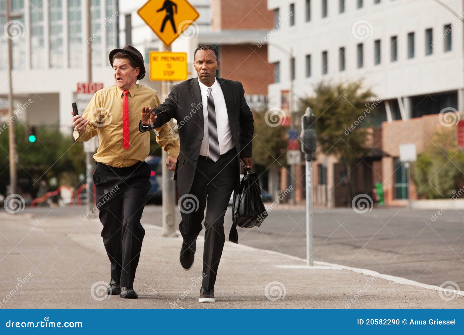 Businessmen in a Hurry stock photo. Image of cellphone - 20582290