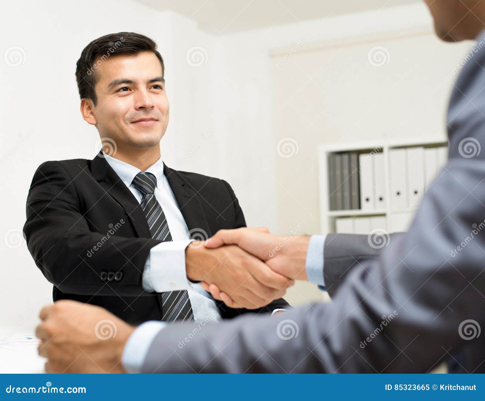 Businessmen Making Handshake in the Office Stock Image - Image of ...