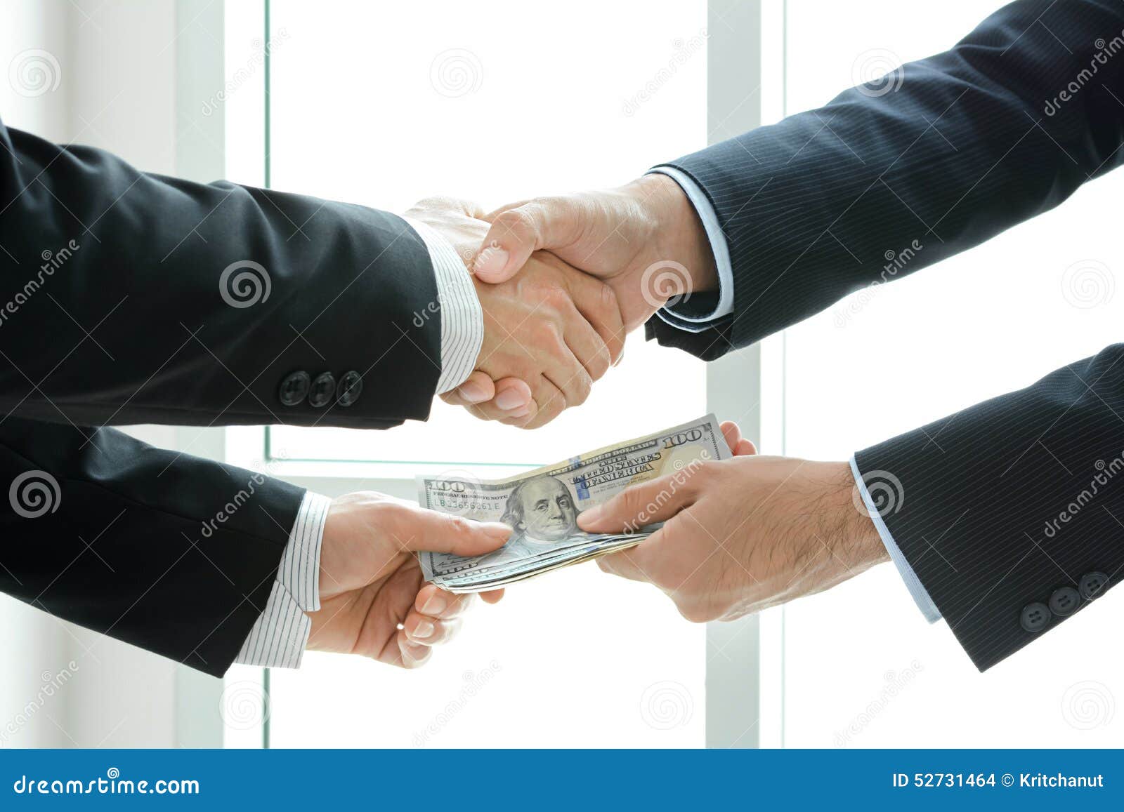 Businessmen Making Handshake while Passing Money Stock Photo - Image of ...