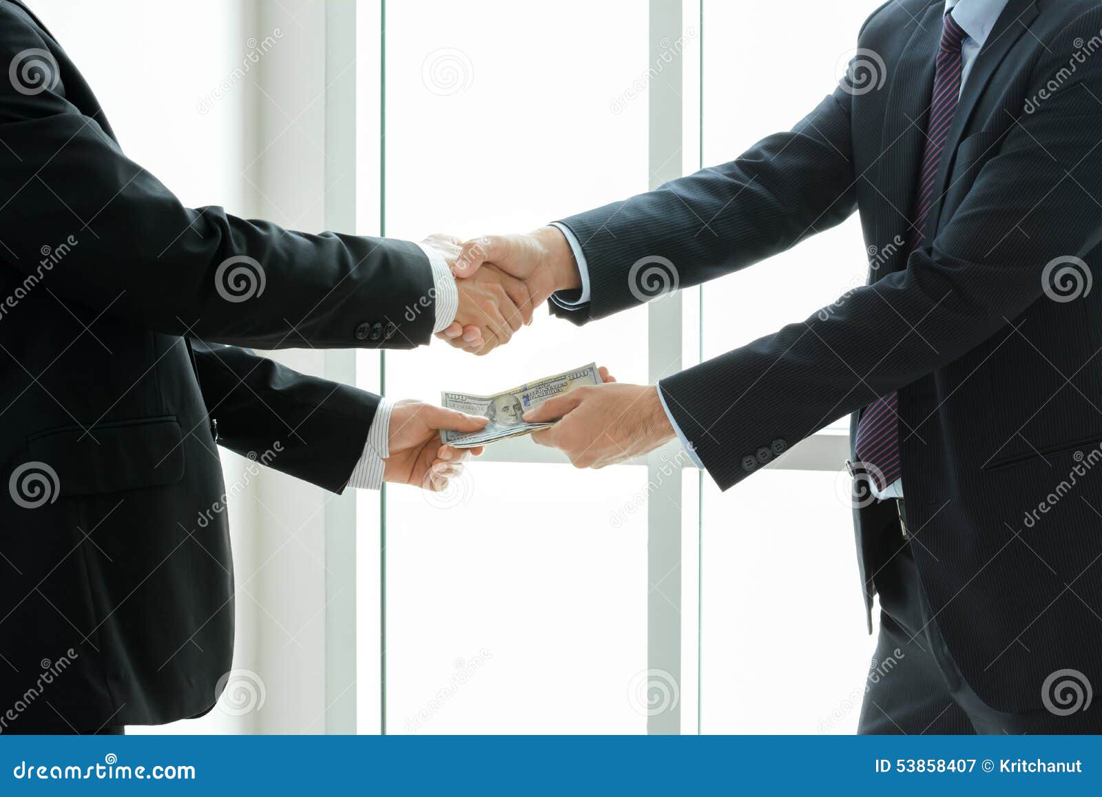 Businessmen Making Handshake while Passing Money Stock Image - Image of ...
