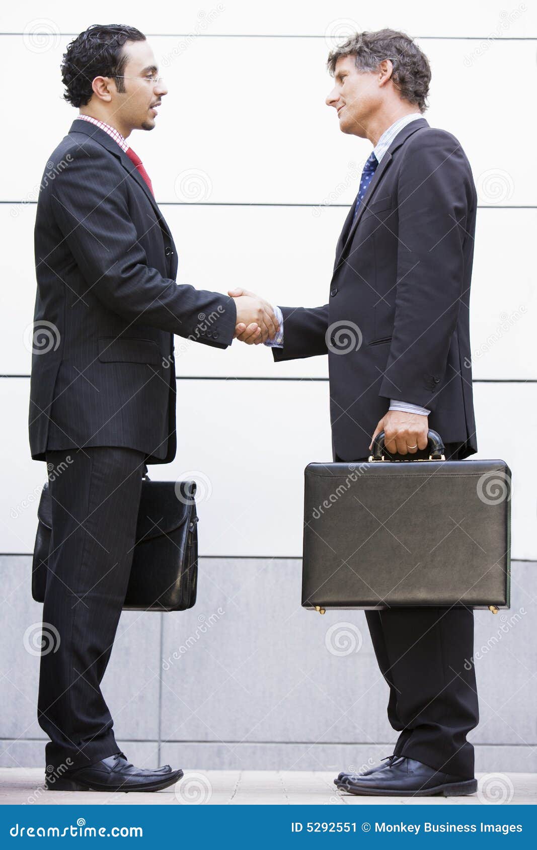 Businessmen Meeting Outside Office Stock Image - Image of female ...