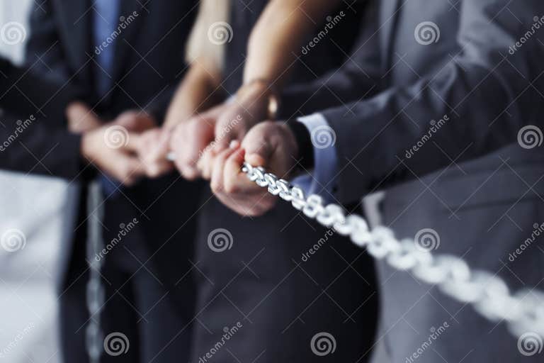 Businessmen pulling chain stock photo. Image of unity - 65569508