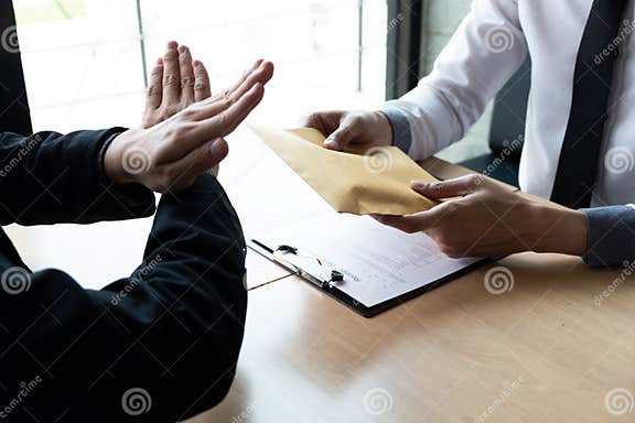 The Businessmen Refusing Accept Bribes in a Brown Envelope at the ...