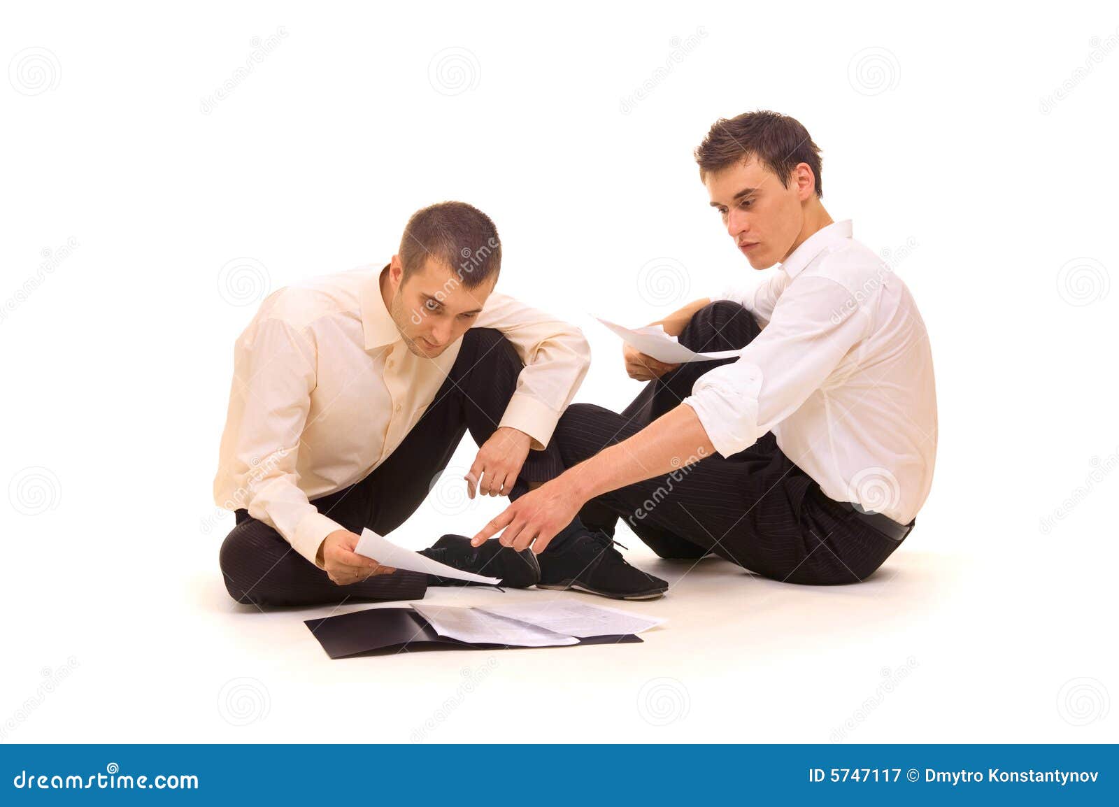 Businessmen Scrutinizing Contracts Stock Image - Image of attention ...