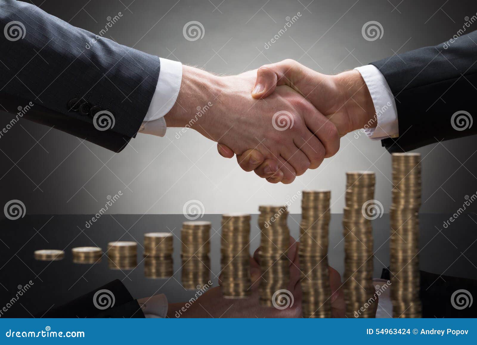 Businessmen Shaking Hands with Coins Stock Photo - Image of coin, male ...