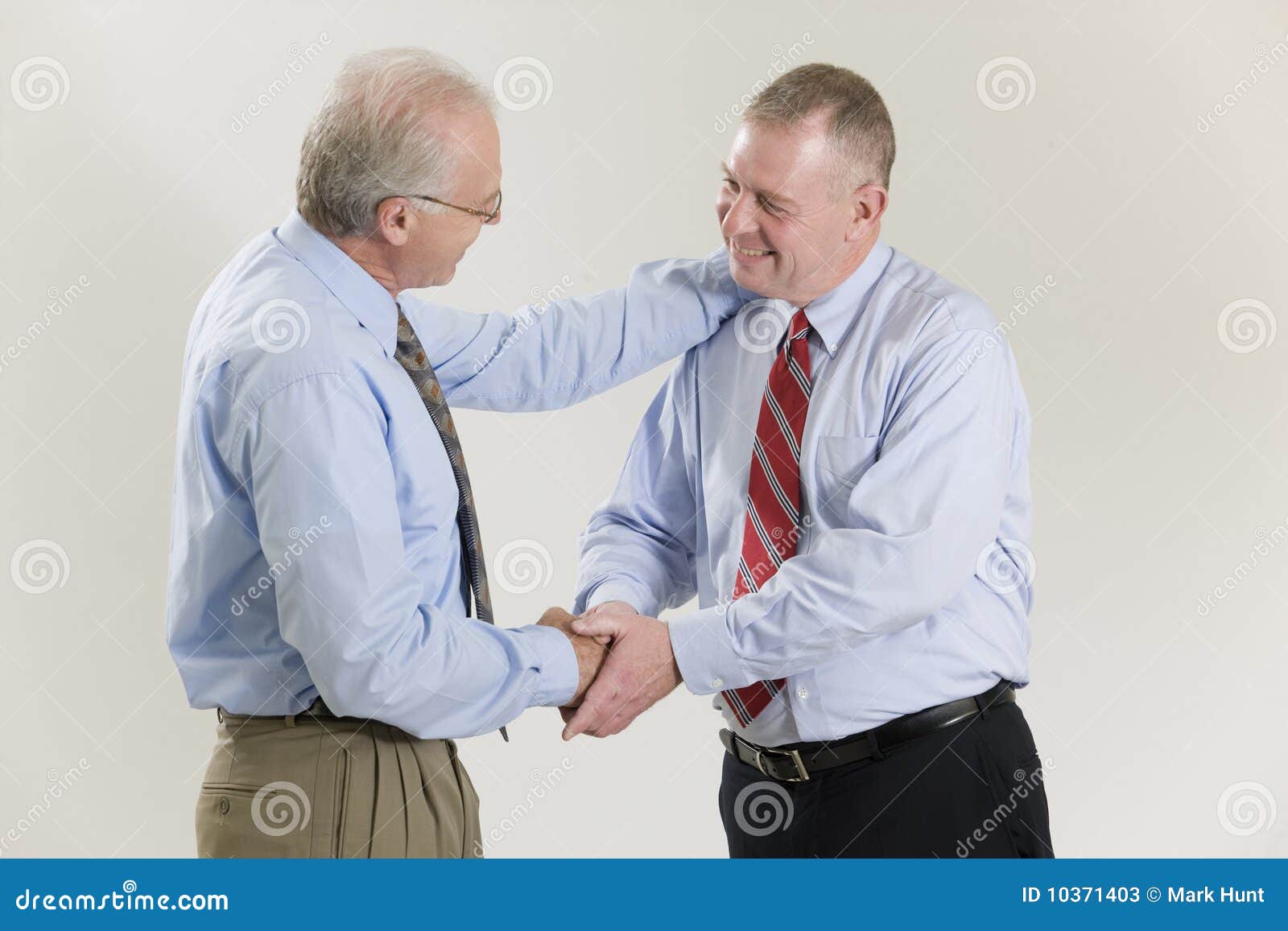 Businessmen Shaking Hands in Congratulations. Stock Image - Image of ...