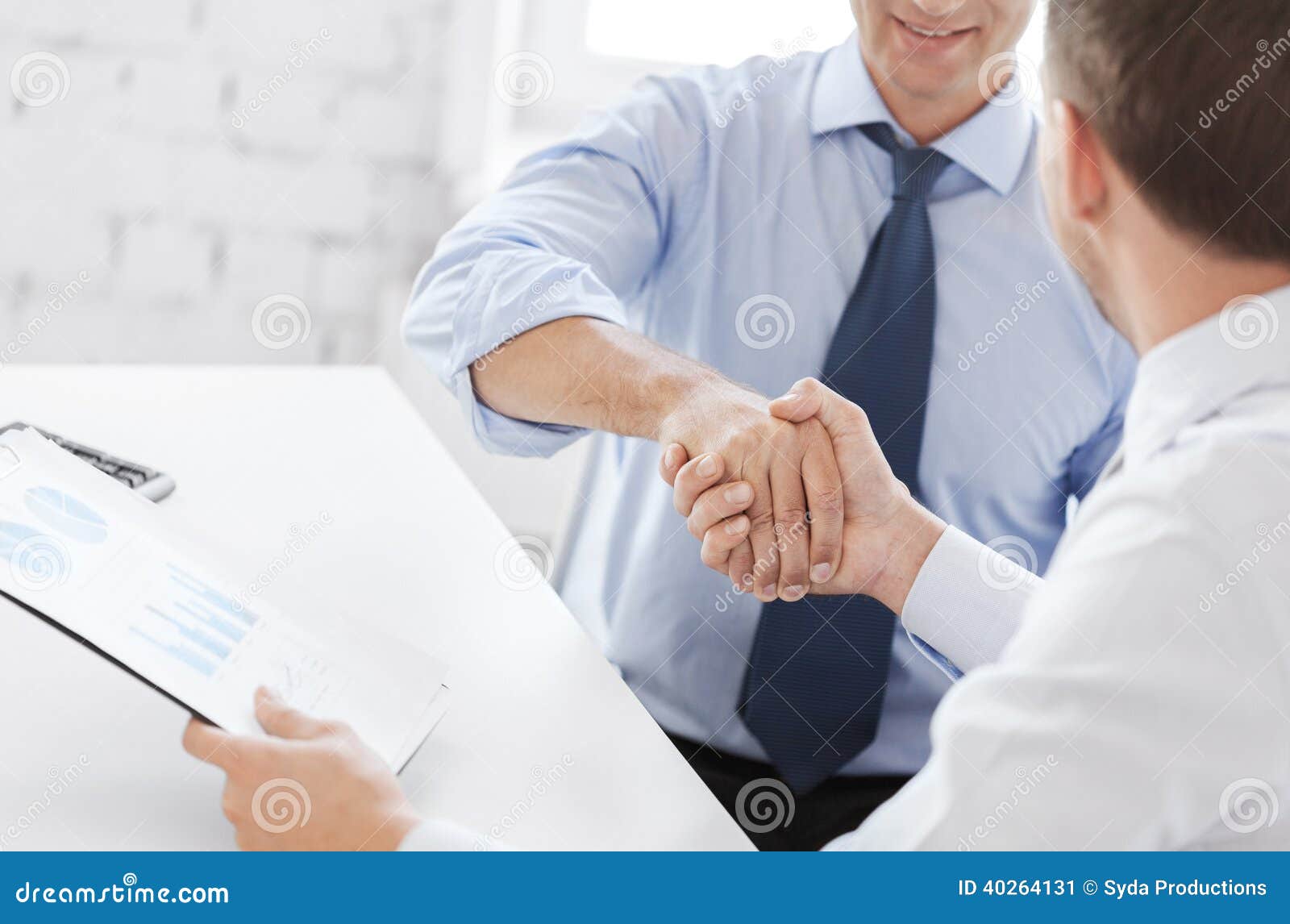 Businessmen Shaking Hands in Office Stock Image - Image of corporate ...