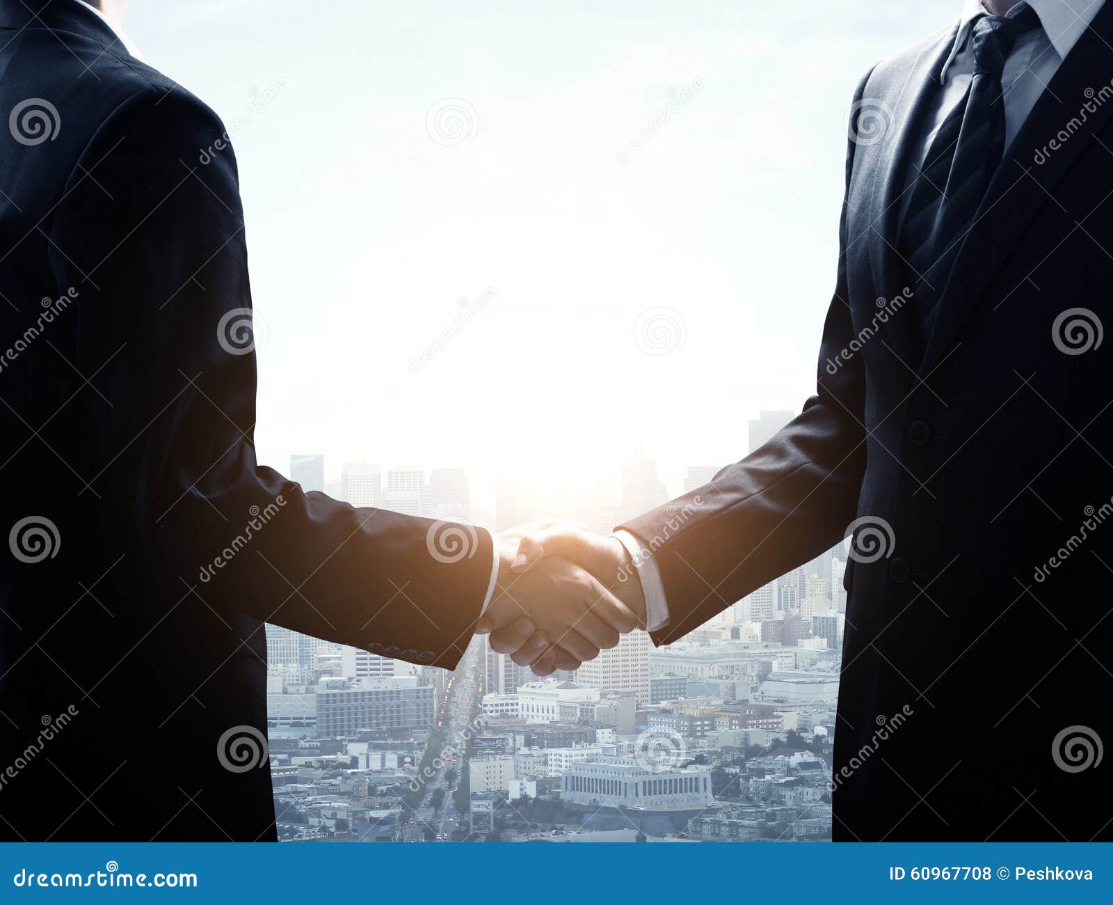 Businessmen shaking hands stock photo. Image of building - 60967708