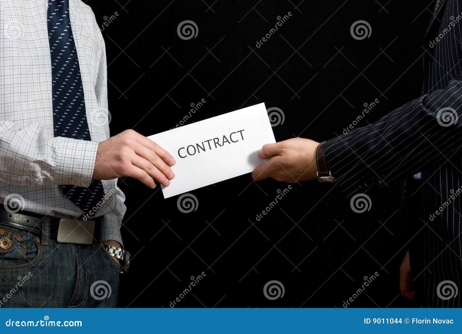 Businessmen Sharing a Contract Stock Photo - Image of adult, hand: 9011044