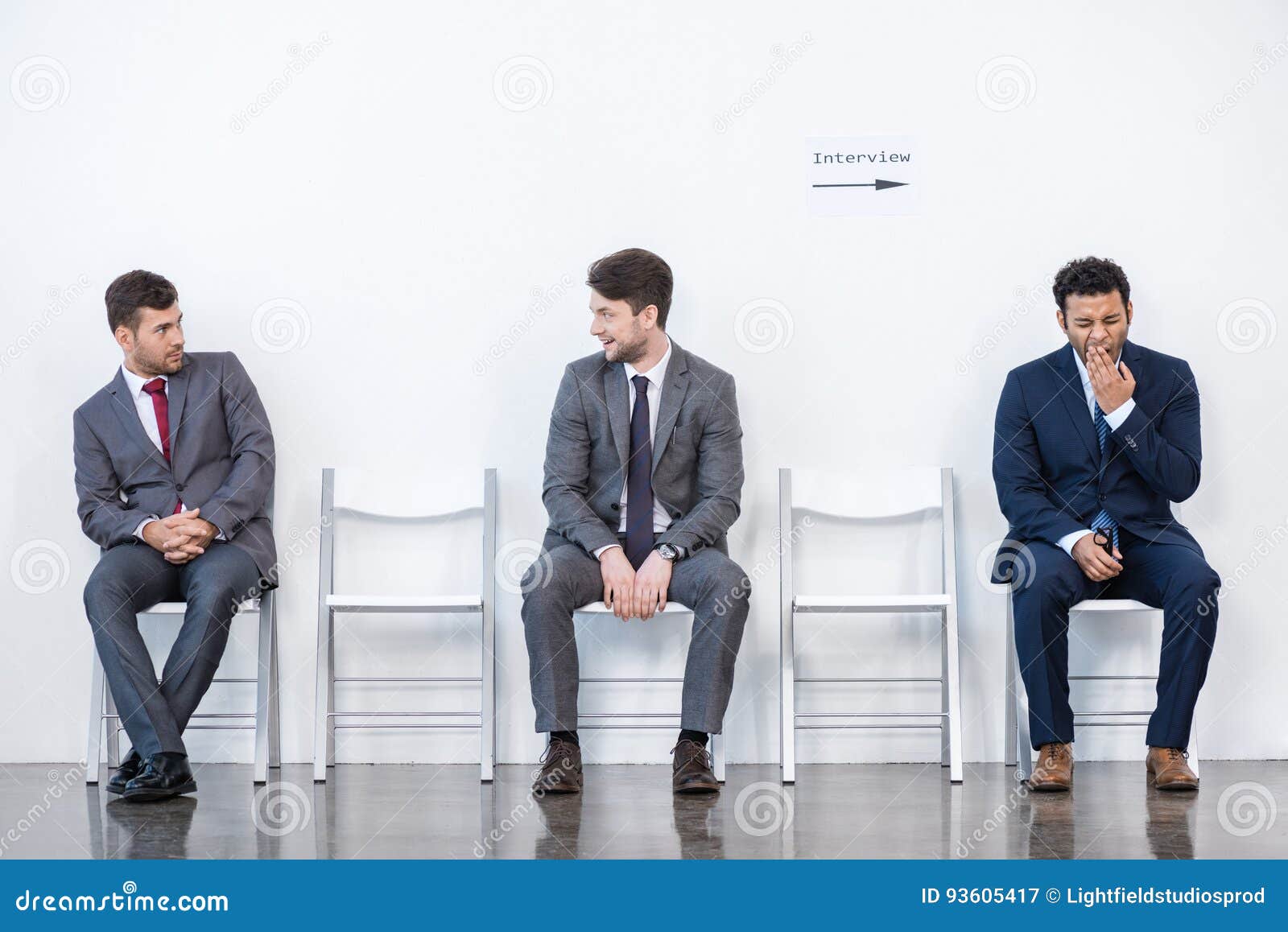 Businessmen Sitting in Queue and Waiting for Interview in Office Stock ...