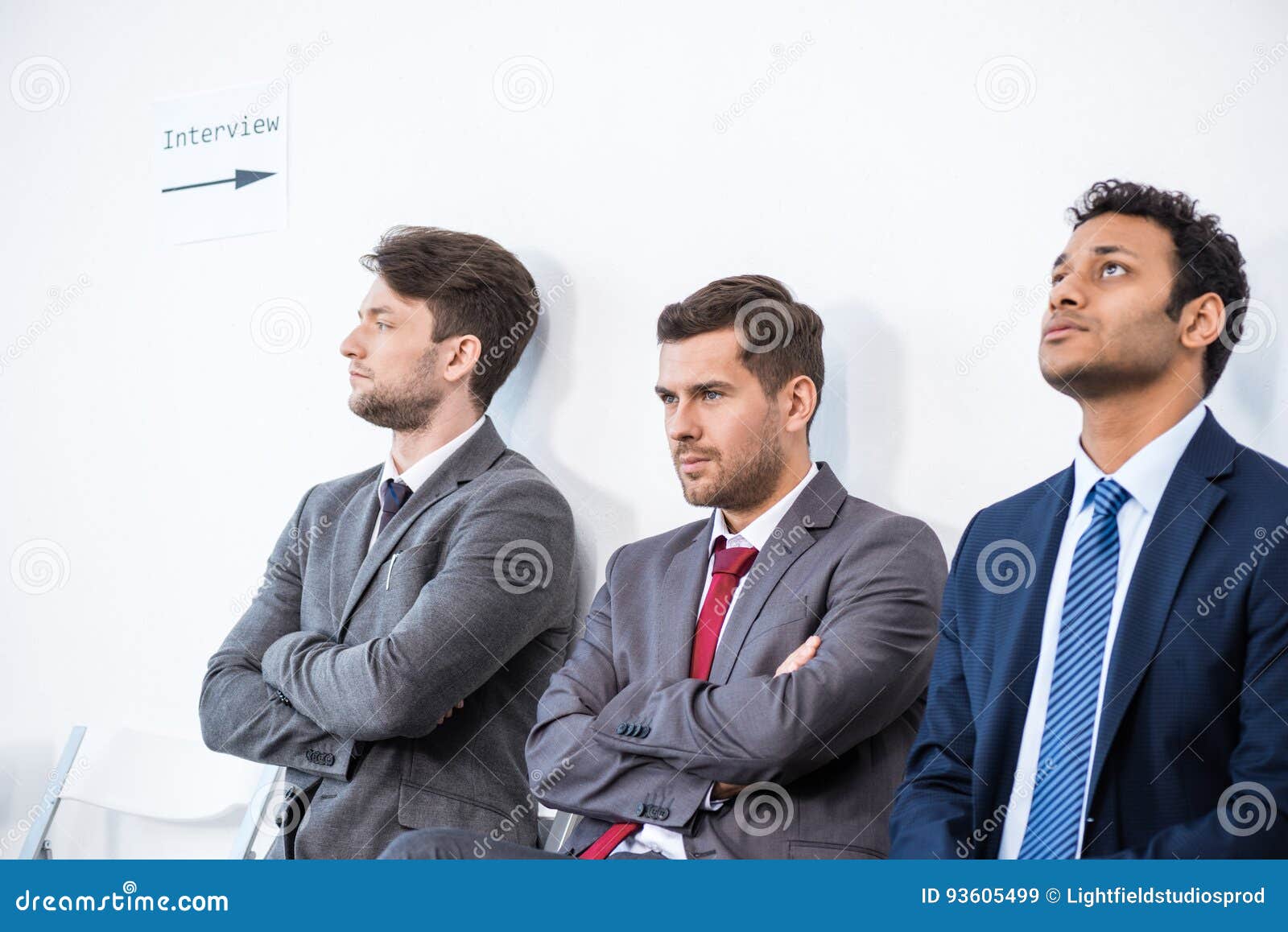 Businessmen Sitting in Queue and Waiting for Interview in Office Stock ...