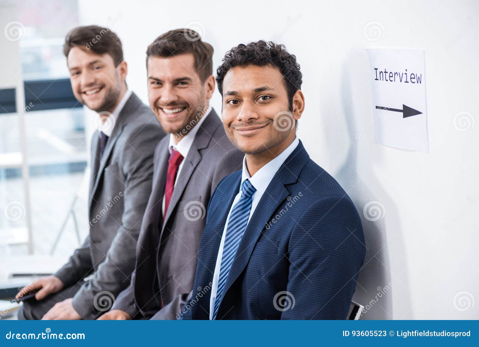Businessmen Sitting in Queue and Waiting for Interview in Office Stock ...