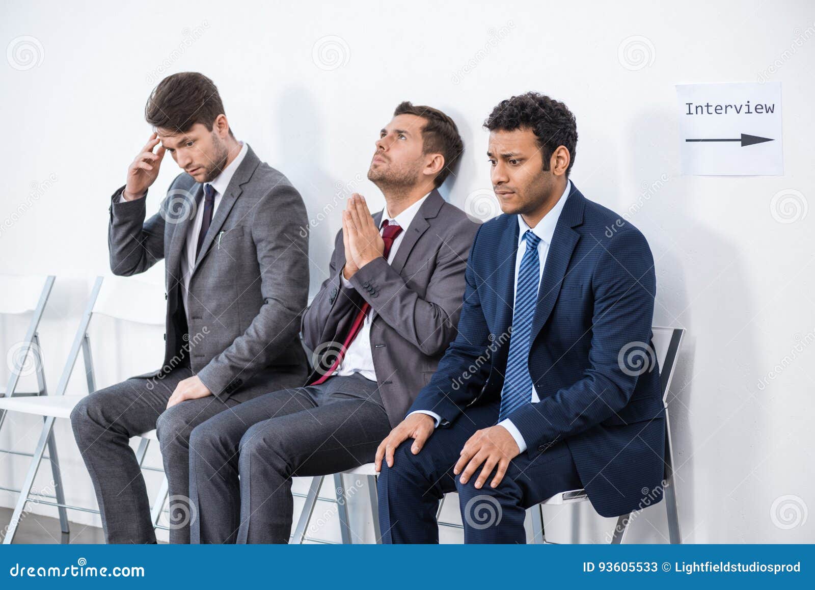 Businessmen Sitting in Queue and Waiting for Interview in Office Stock ...